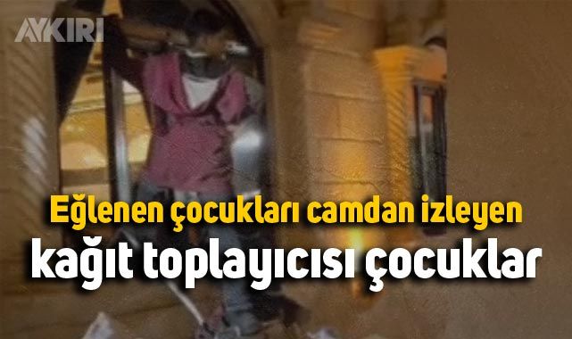 Eğlenen çocukları camdan izleyen kağıt toplayıcısı çocuklar - Yaşam ... Eğlenen çocukları camdan izleyen kağıt toplayıcısı çocuklar - Yaşam ...